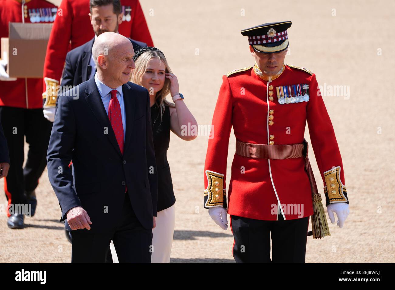 Defence Secretary John Healy (left) arrives for the Trooping the Colour ...