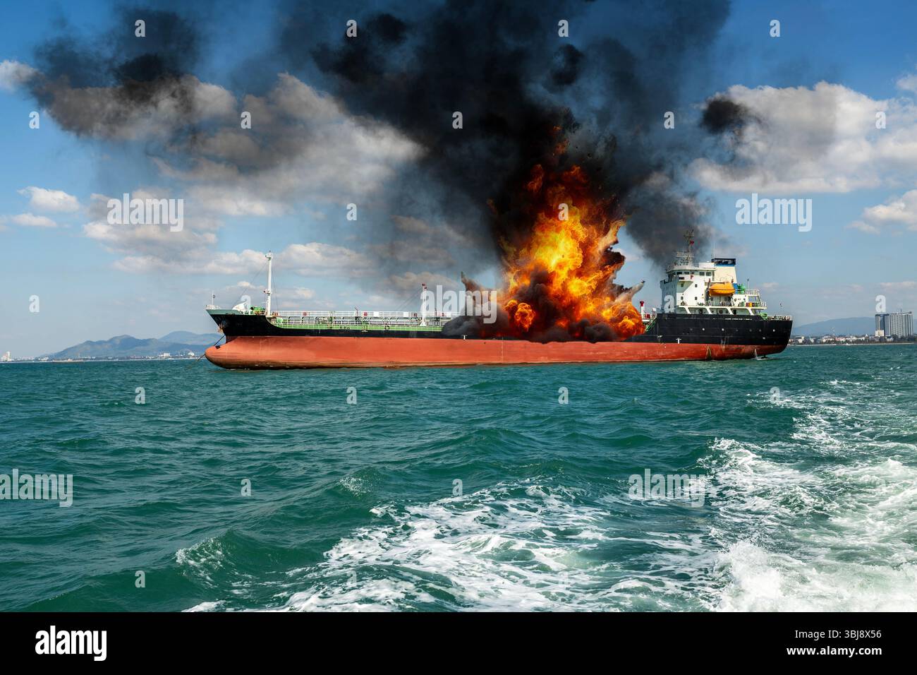 Fire on a cargo ship. A ship carrying liquefied gas is engulfed in ...