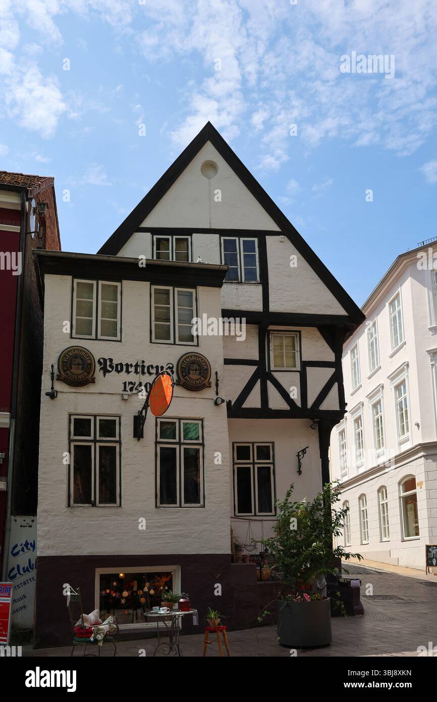 Flensburg, Germany - 13. June 2025: White half-timbered house stands ...