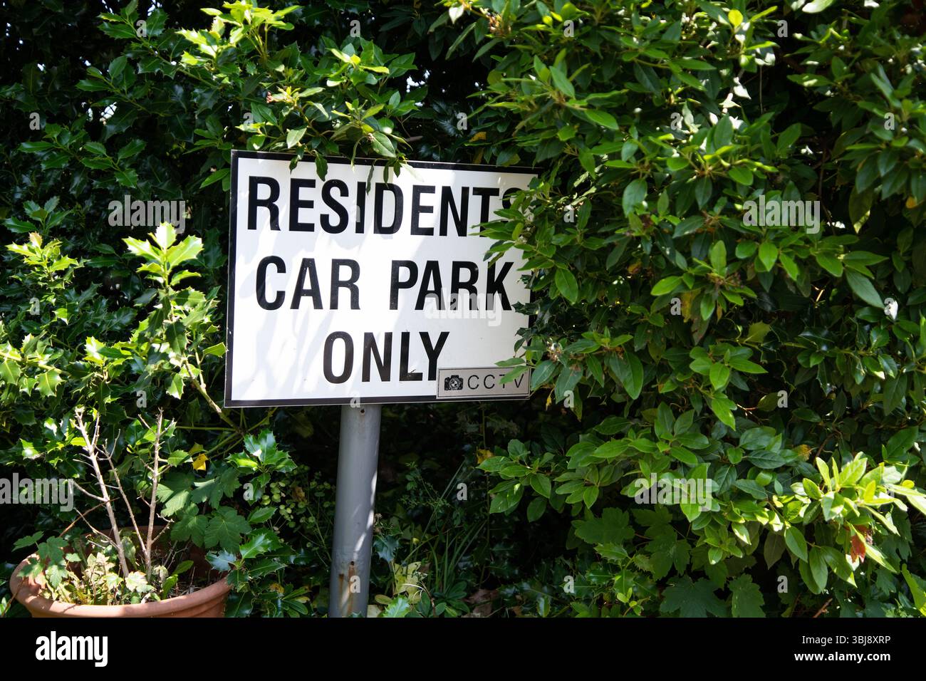 “Residents Car Park Only” sign on Government Row, indicating parking is ...