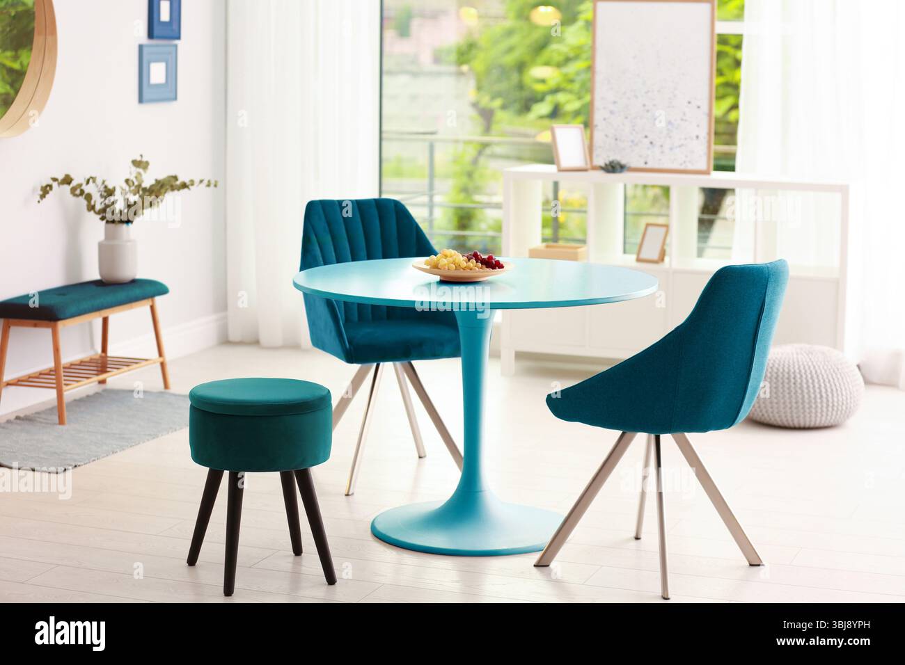 Blue dining table and chairs in room. Interior design Stock Photo - Alamy