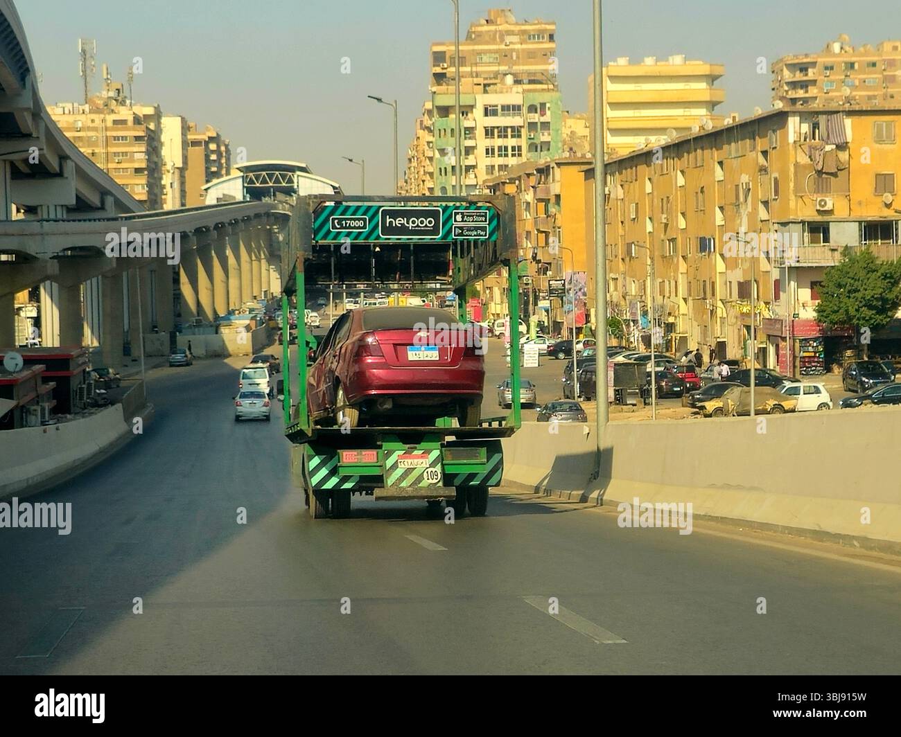 Cairo, Egypt, June 12 2025: Helpoo Electric vehicle mounted lifting ...