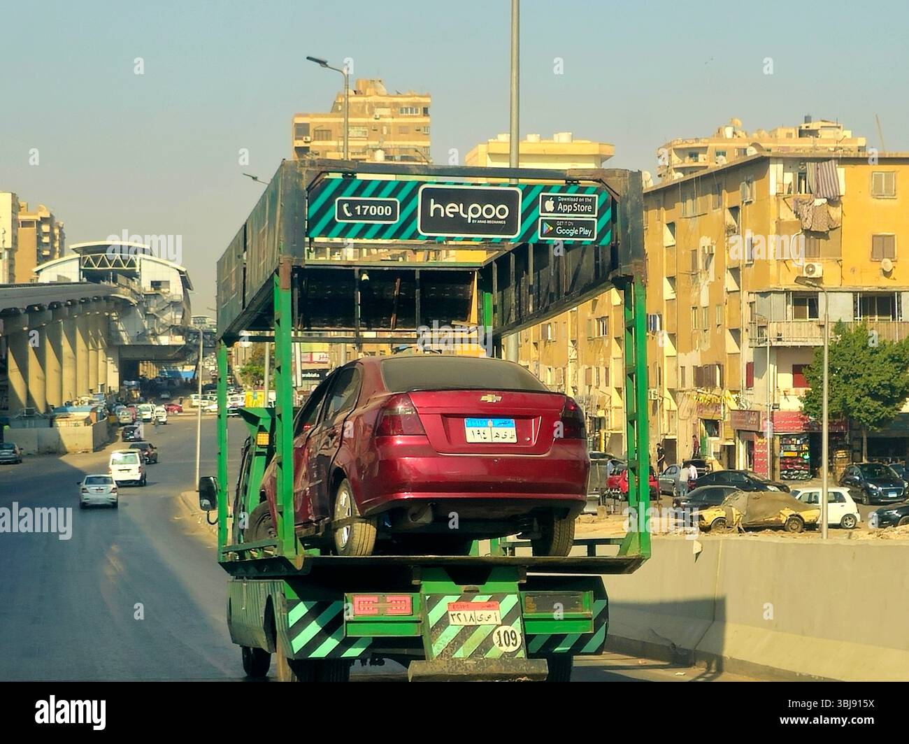 Cairo, Egypt, June 12 2025: Helpoo Electric vehicle mounted lifting ...