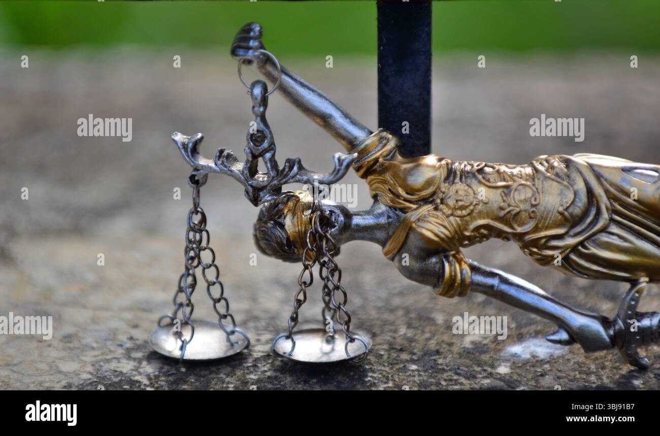 Sculpture of blind Themis holding empty scales, mythological Greek ...