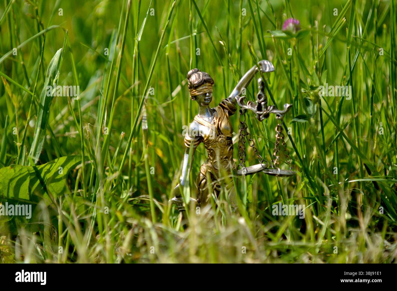Sculpture of blind Themis holding empty scales, mythological Greek ...