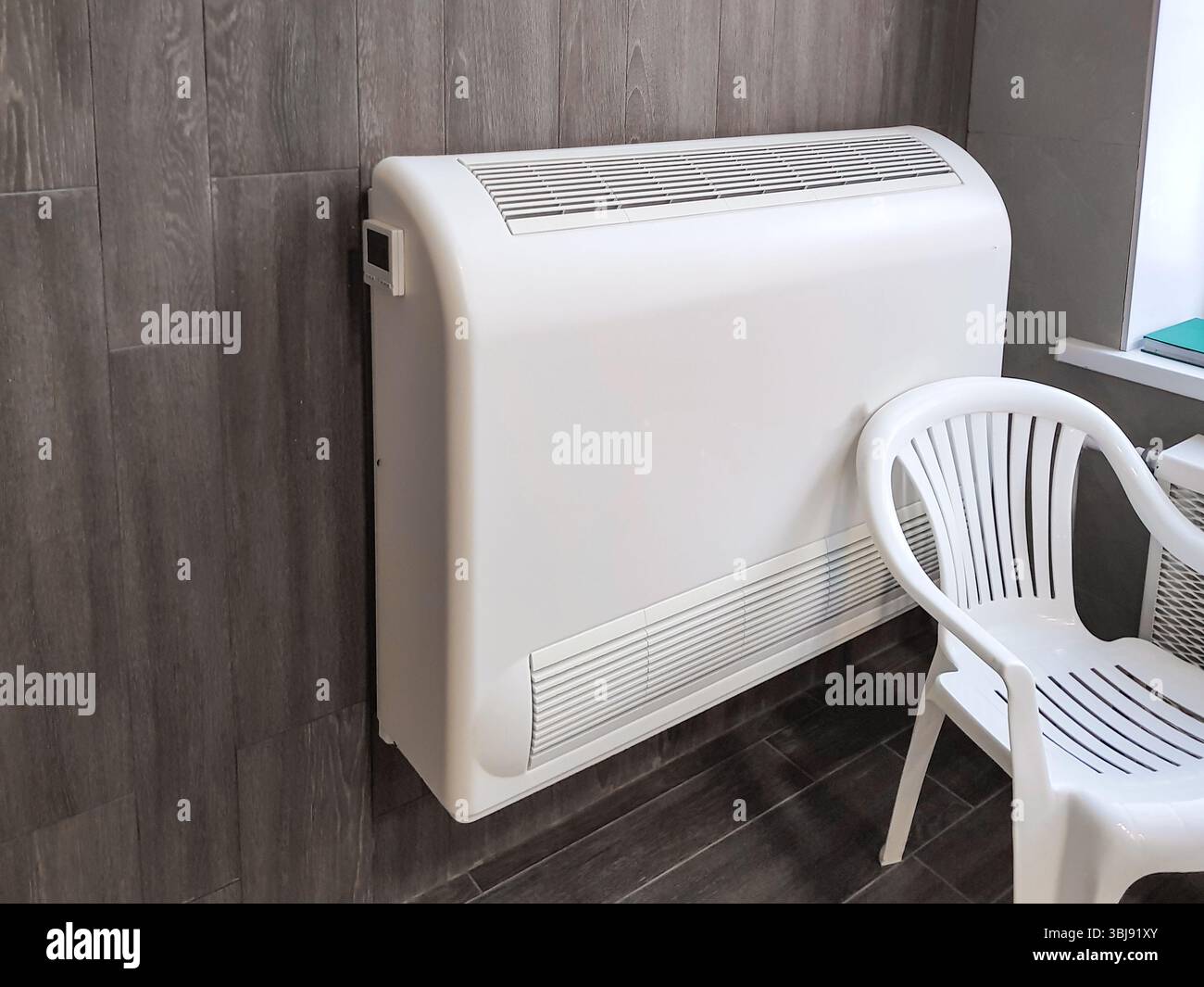 Aesthetic modern room design with split system on brown wooden wall ...