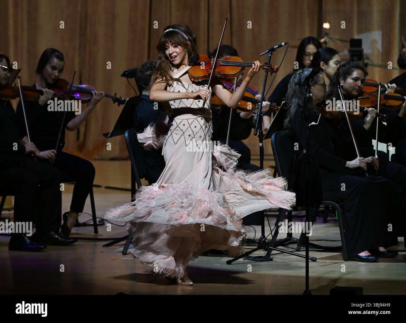 Miami, FL, USA. 13th June, 2025. Lindsey Stirling performs during A ...