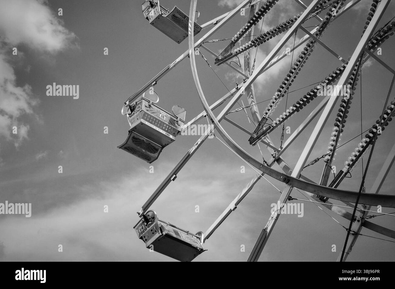 Colorful fairground ride in Black and White Stock Photos & Images - Alamy