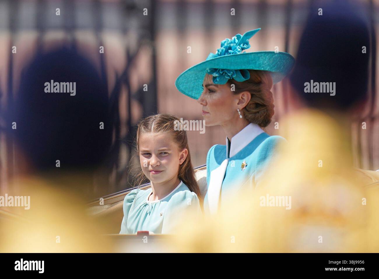 Kate, Princess of Wales with her daughter Princess Charlotte ride in a ...