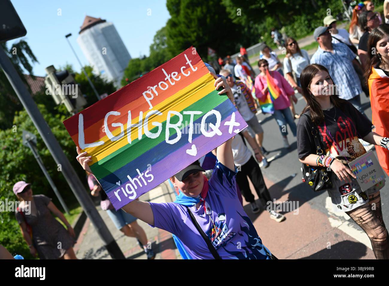 "Protect LGHGBTQ+ Rights" is written on a demonstrator's poster during ...