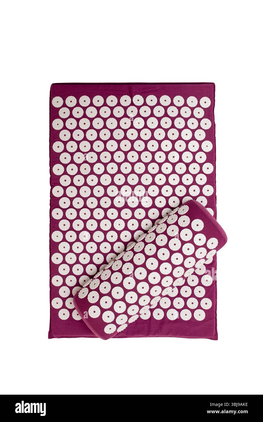 Close-up of spikes on an acupressure mat, on a white background ...
