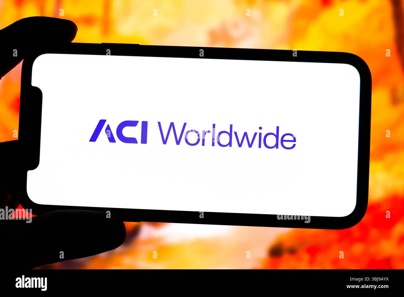 In this photo illustration, an ACI Worldwide logo is seen displayed on ...