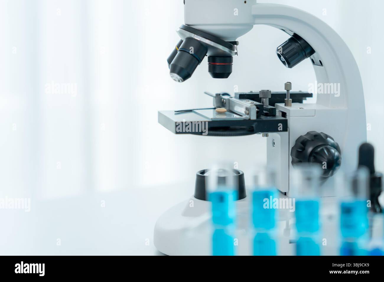 Scientist analyze biochemical samples in advanced scientific laboratory ...