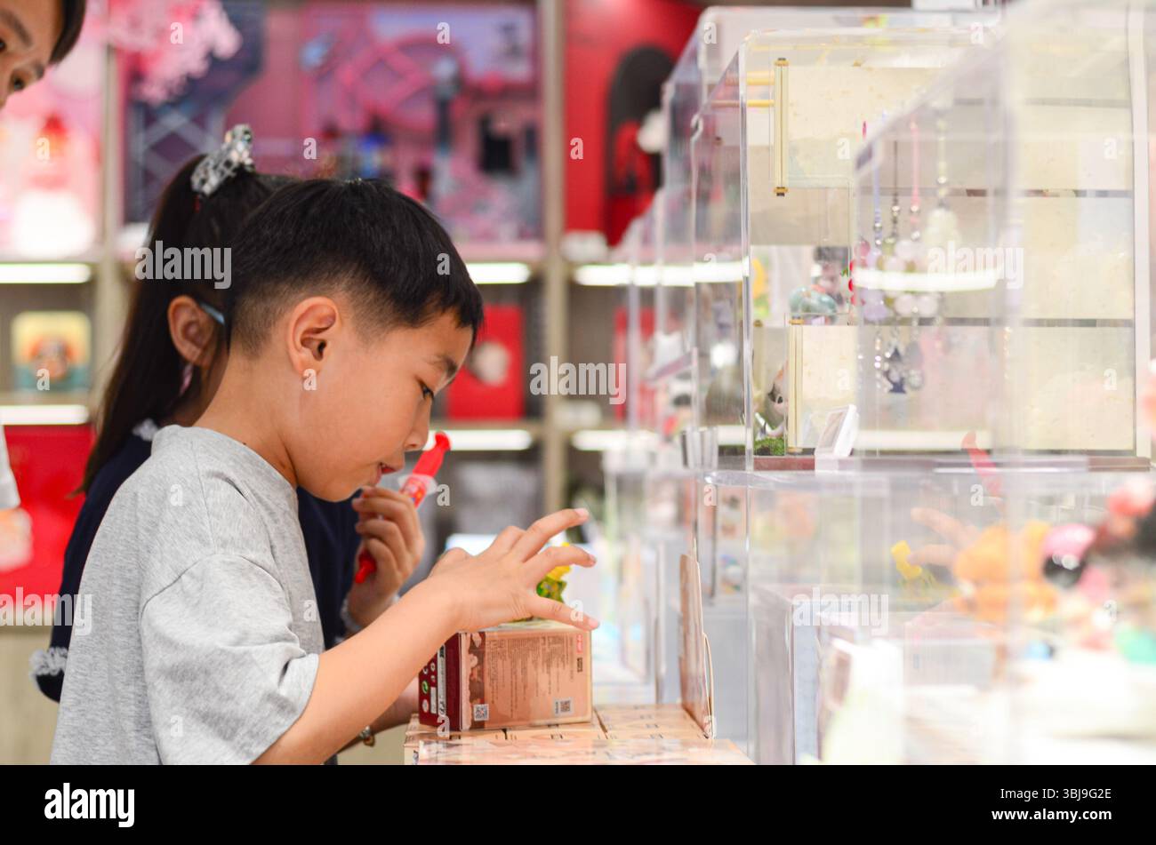 Jiangmen,Guangdong,China.14 June,2025.Customers selecting Labubu ...
