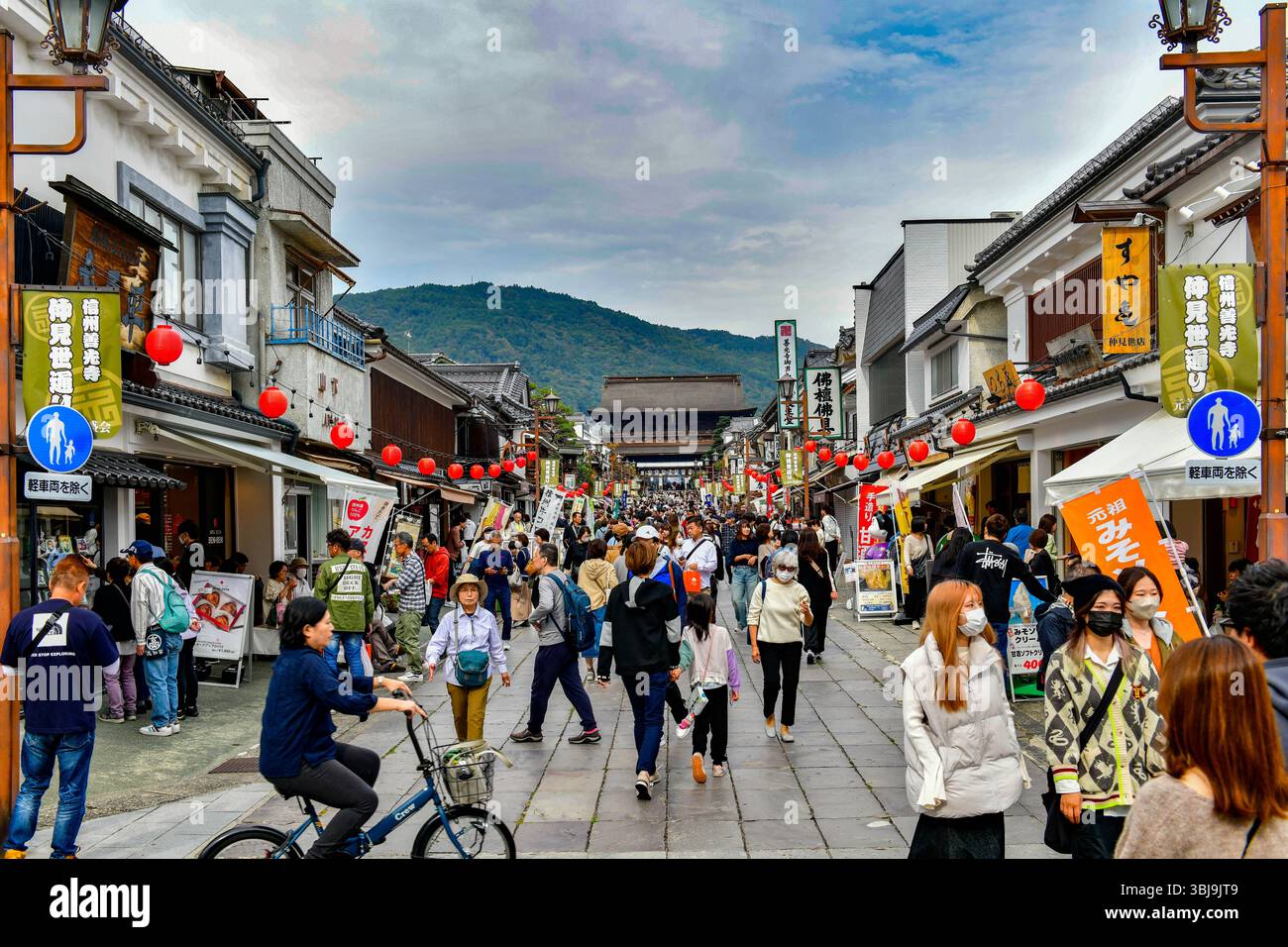 Nagano Japan -26-10-2024 : People walk along Nakamise Shopping Street ...