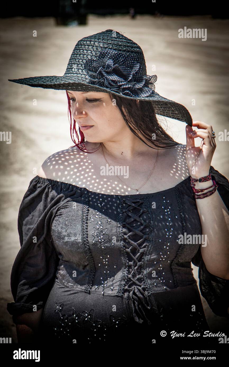 Woman in black long sleeve hi-res stock photography and images - Alamy