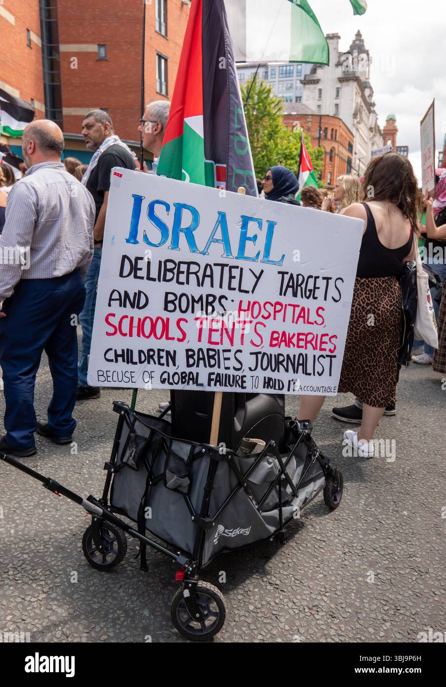 Childs push chair with placard criticising Israel's actions. Pro ...