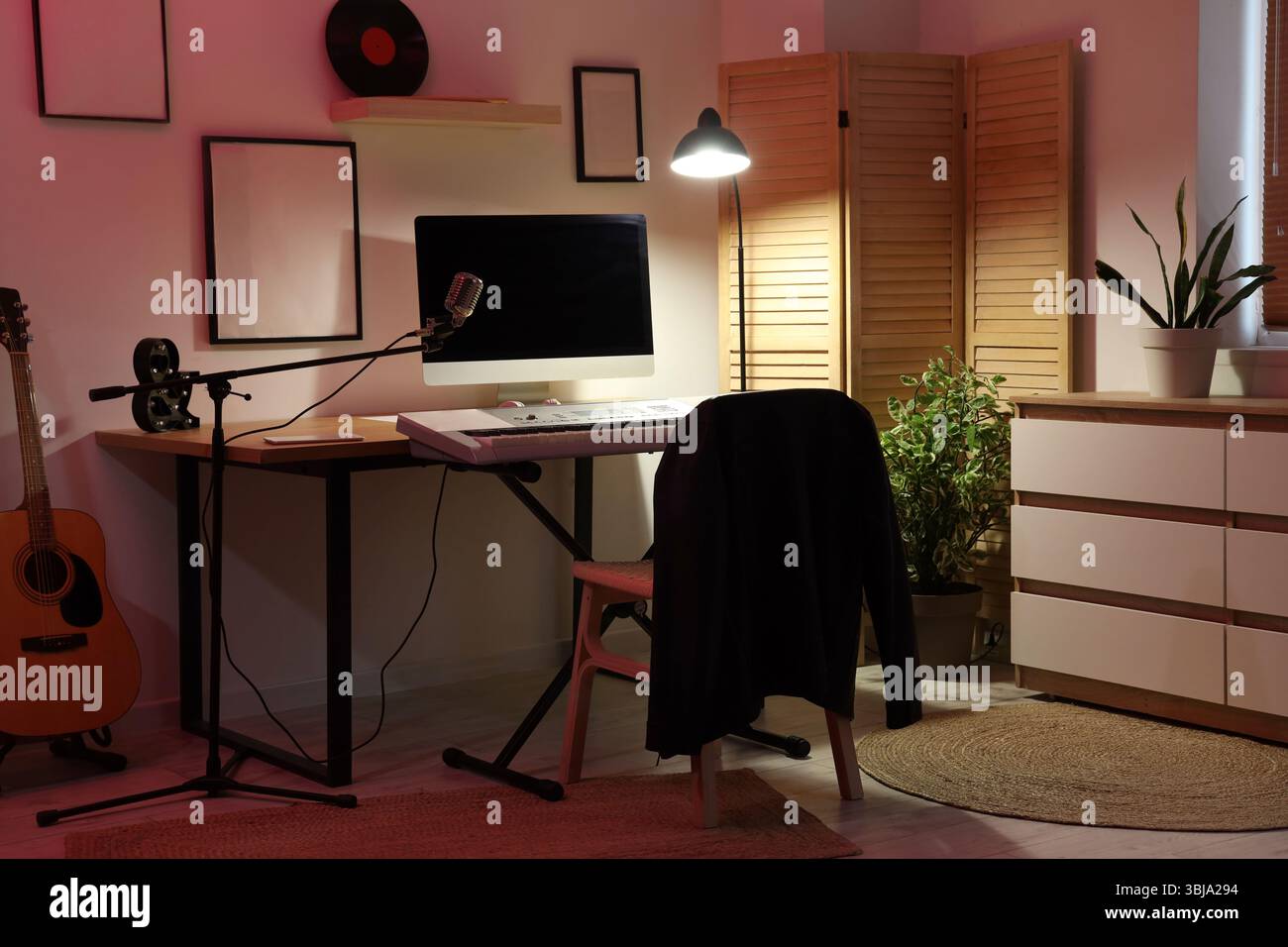 Interior of dark recording studio with workplace and musical ...