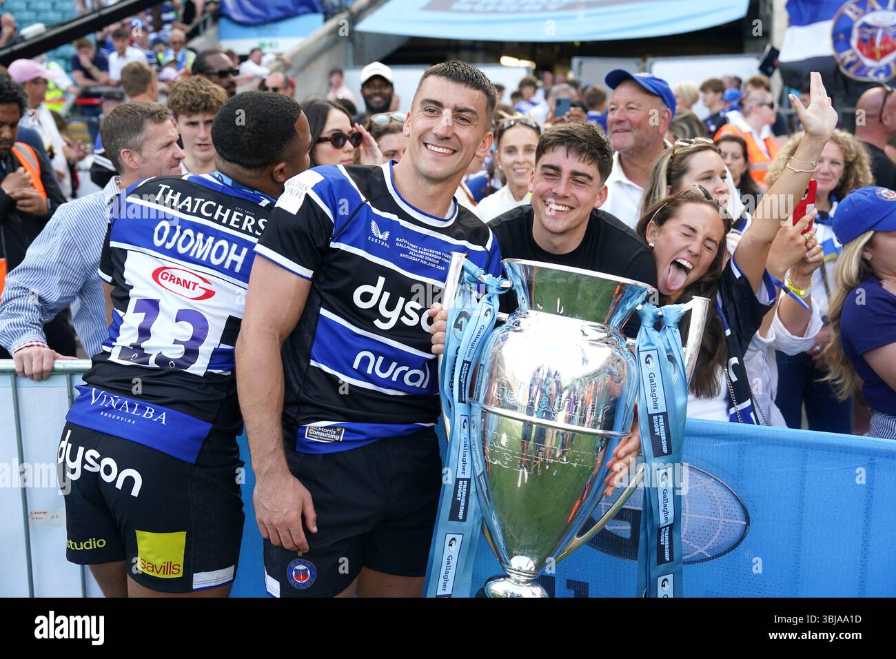 Bath Rugby's Cameron Redpath (centre) celebrates with the trophy after ...