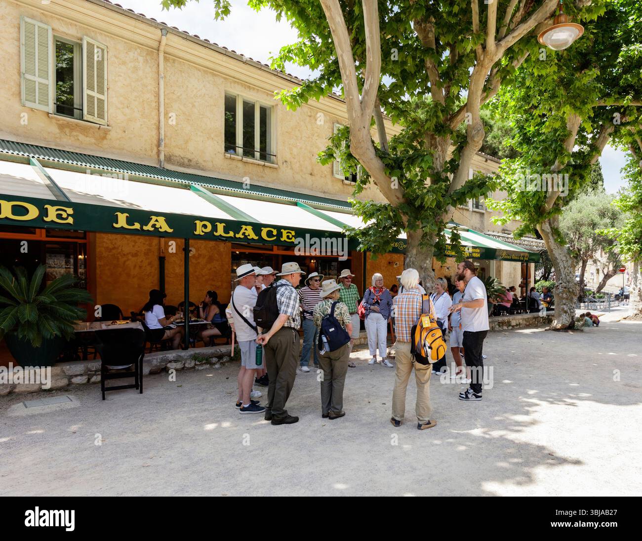 Saint-Paul-de-Vence, France - June 1, 2025: Tourists with their guide ...
