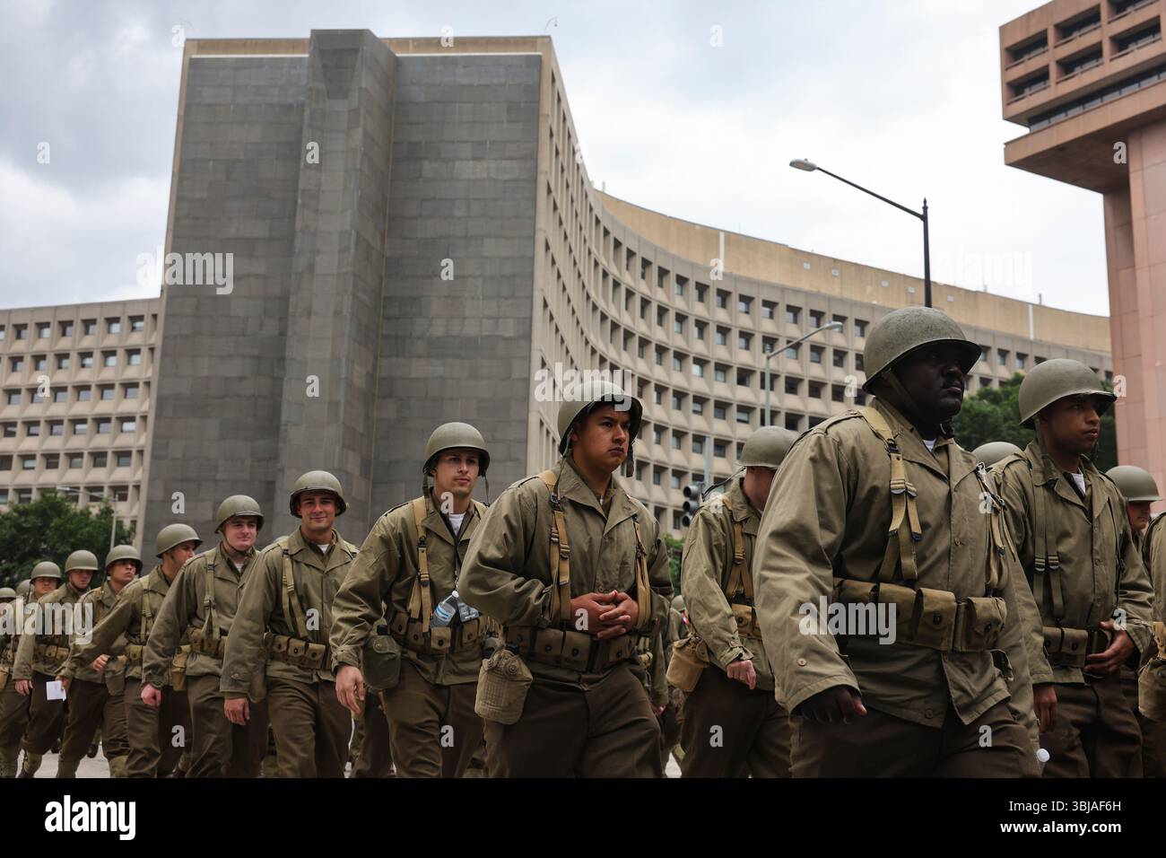Members of the military walk near the National Mall ahead of a military ...