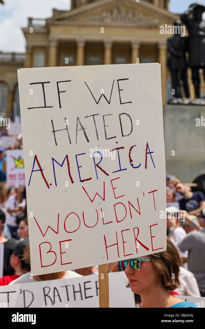 Des Moines, Iowa, USA. 14th June, 2025. A protester carries a sign in ...