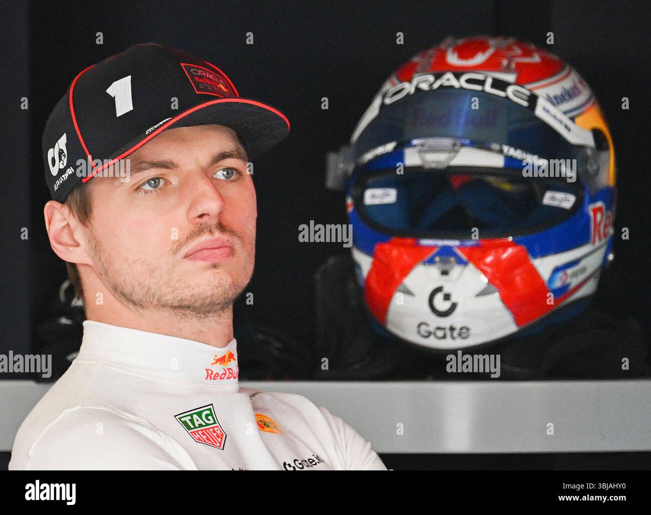Red Bull Racing driver Max Verstappen, of the Netherlands, stands in ...