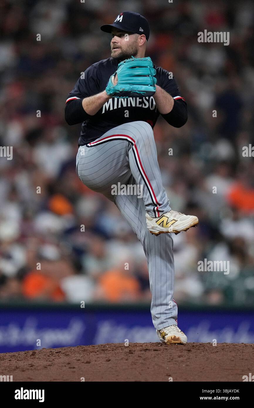 Minnesota Twins pitcher Danny Coulombe (54) delivers during the eighth ...