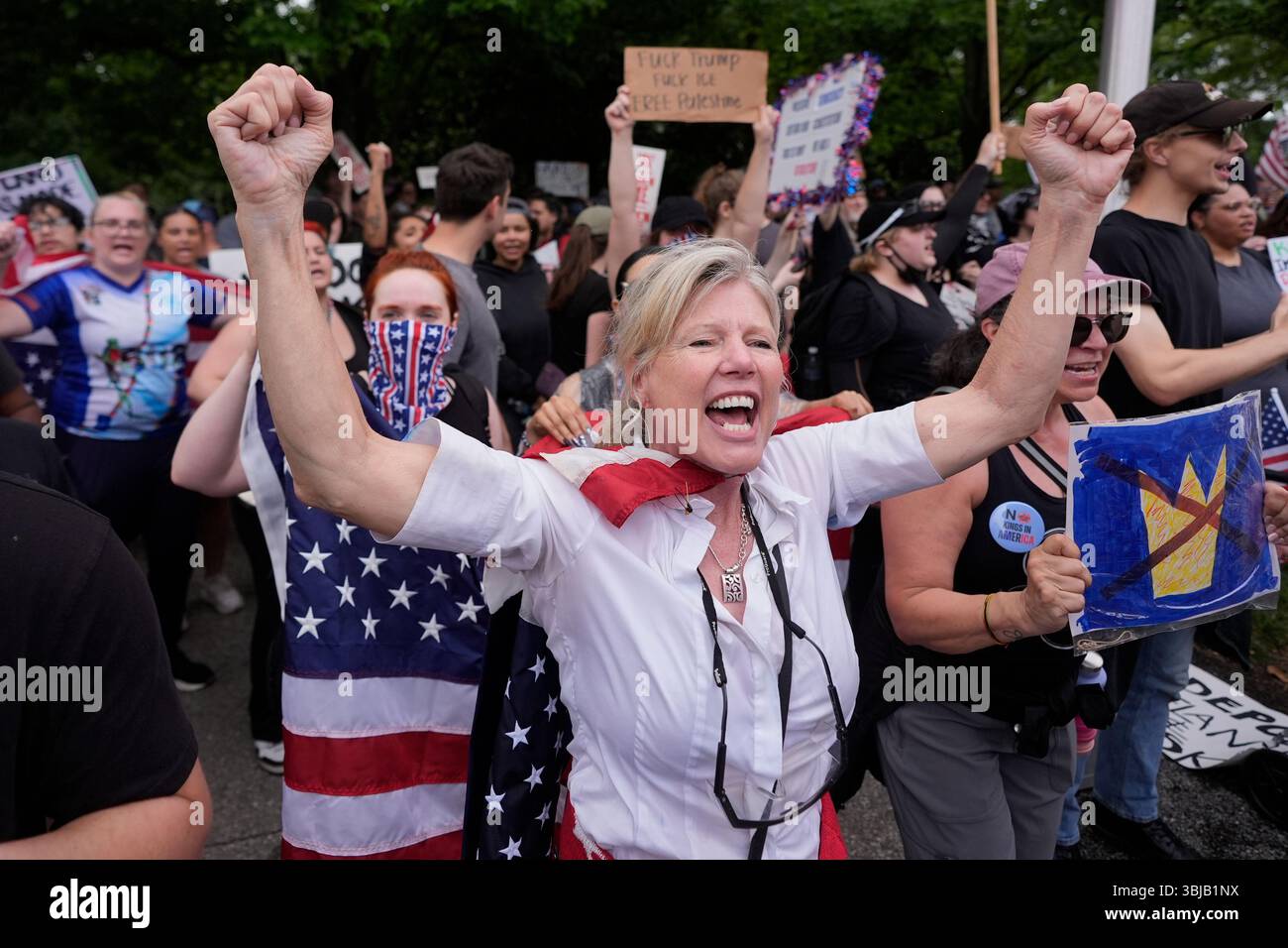 Jenny Thinnes yells during a "No Kings" protest Saturday, June 14, 2025 ...