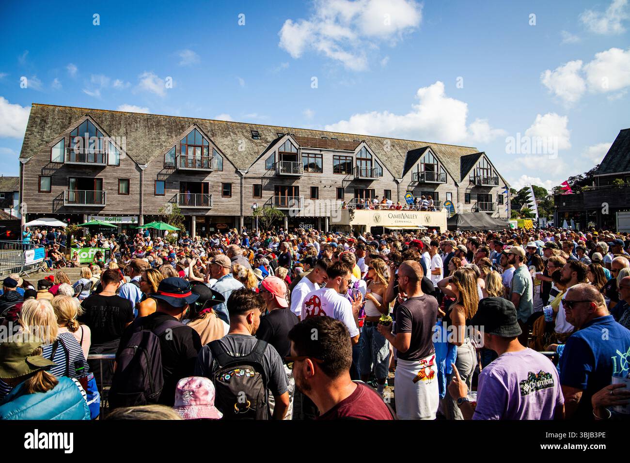 Falmouth, UK. 14th June 2025. Spectators watch performances on stage at ...