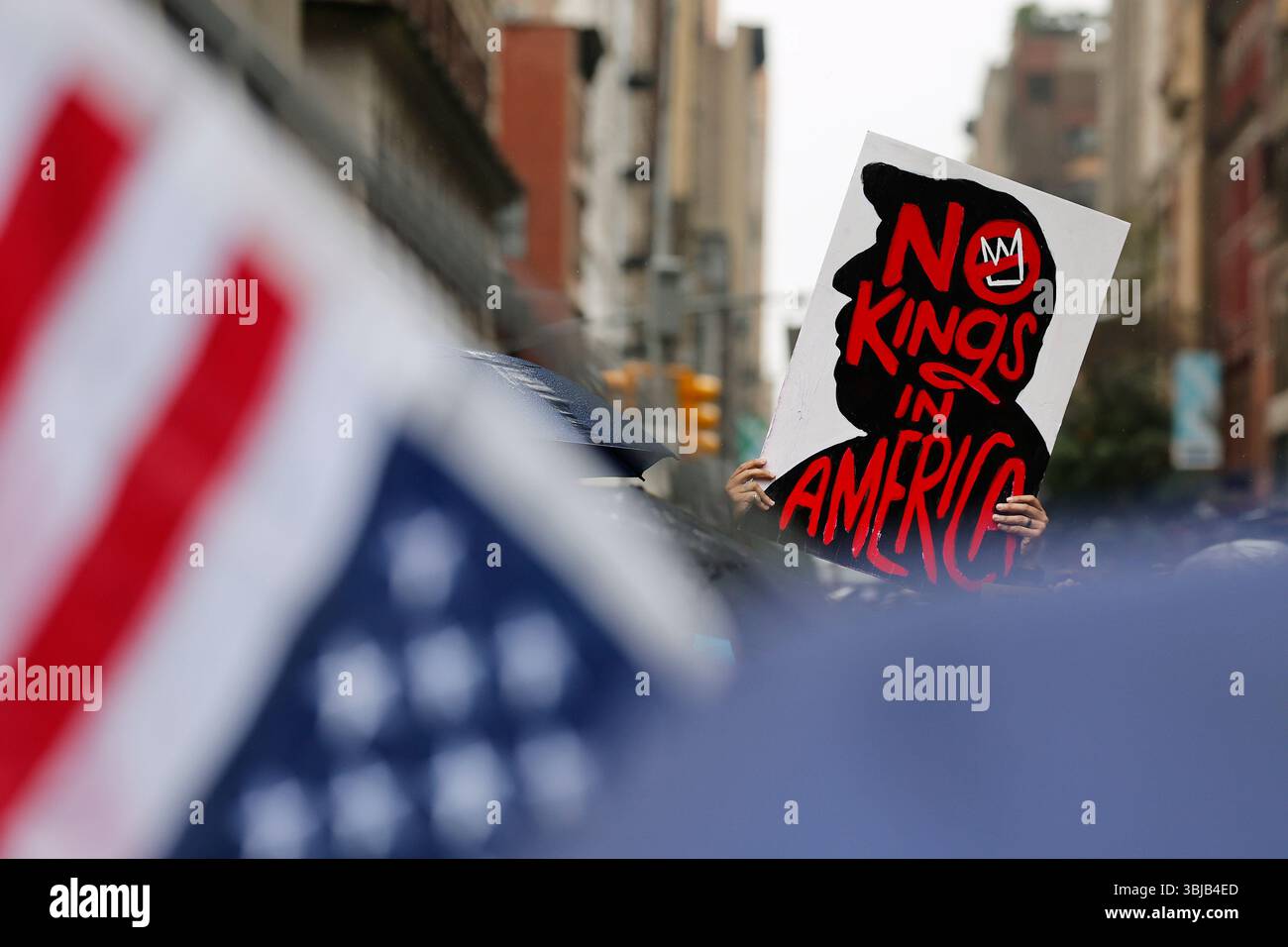 Demonstrators march down Fifth Avenue during the "No Kings" protest ...