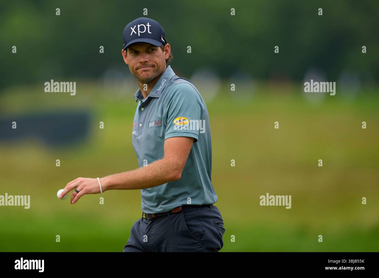 Adam Schenk after putting in on the eighth hole during the third round ...