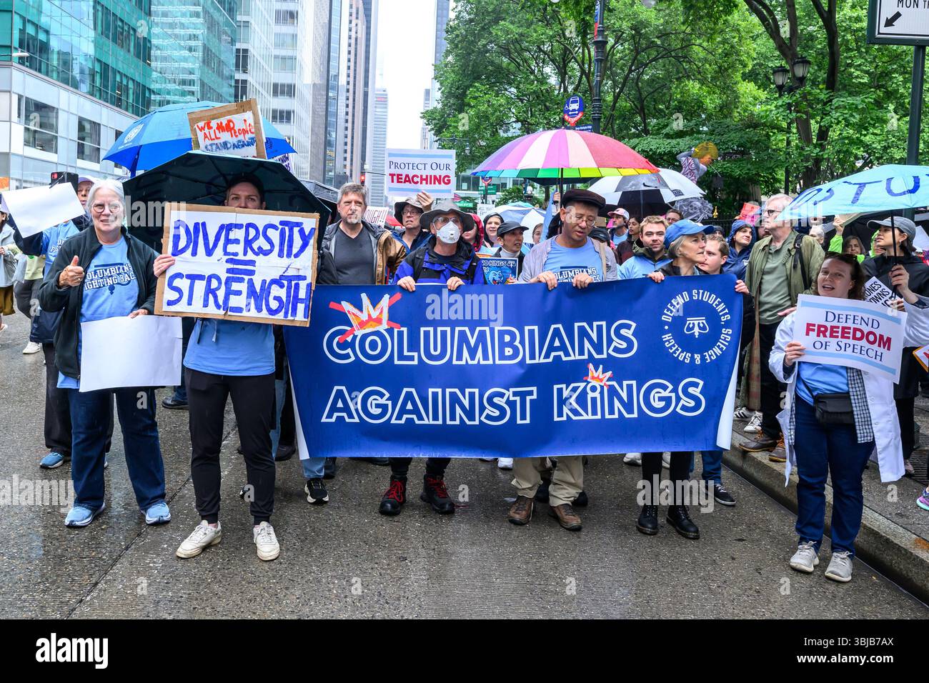 New York, USA. 14th June, 2025. People defy the rain and carry anti ...