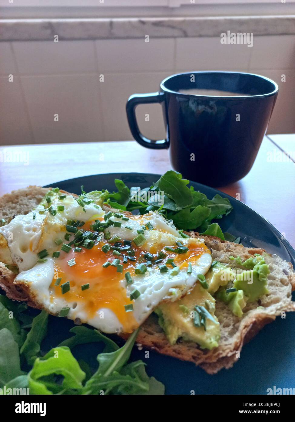 Fresh avocado toast topped greens hi-res stock photography and images ...