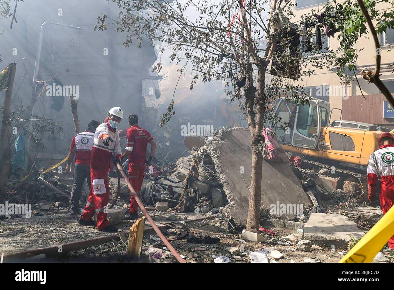 Tehran, Iran. 14th June, 2025. Iranian Red Crescent volunteers gather ...