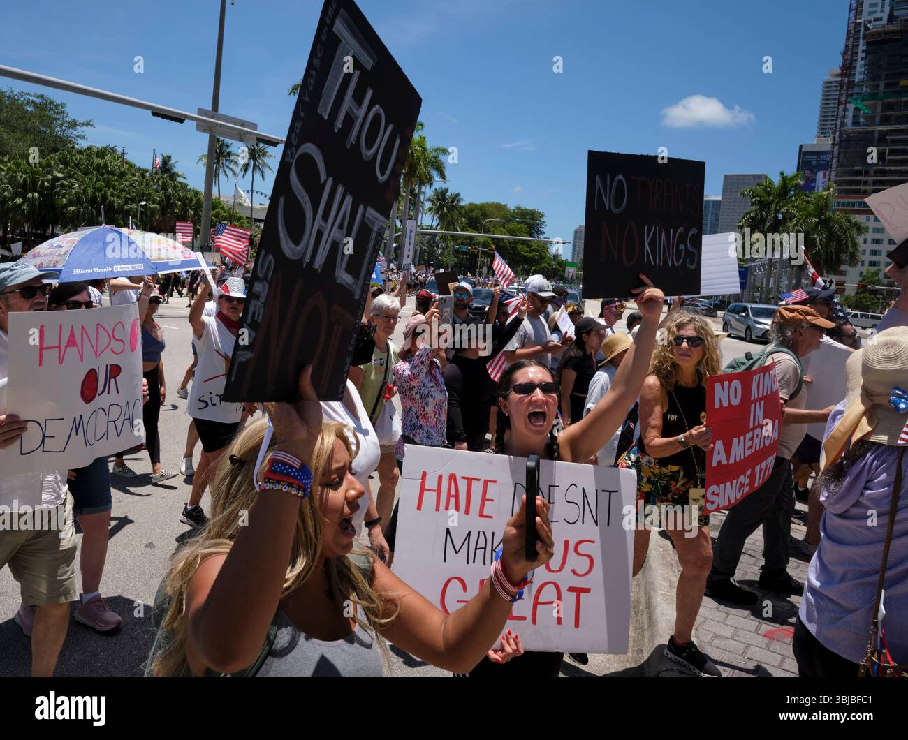 Miami, Florida, USA. 14th June, 2025. A mass of protesters chant and ...
