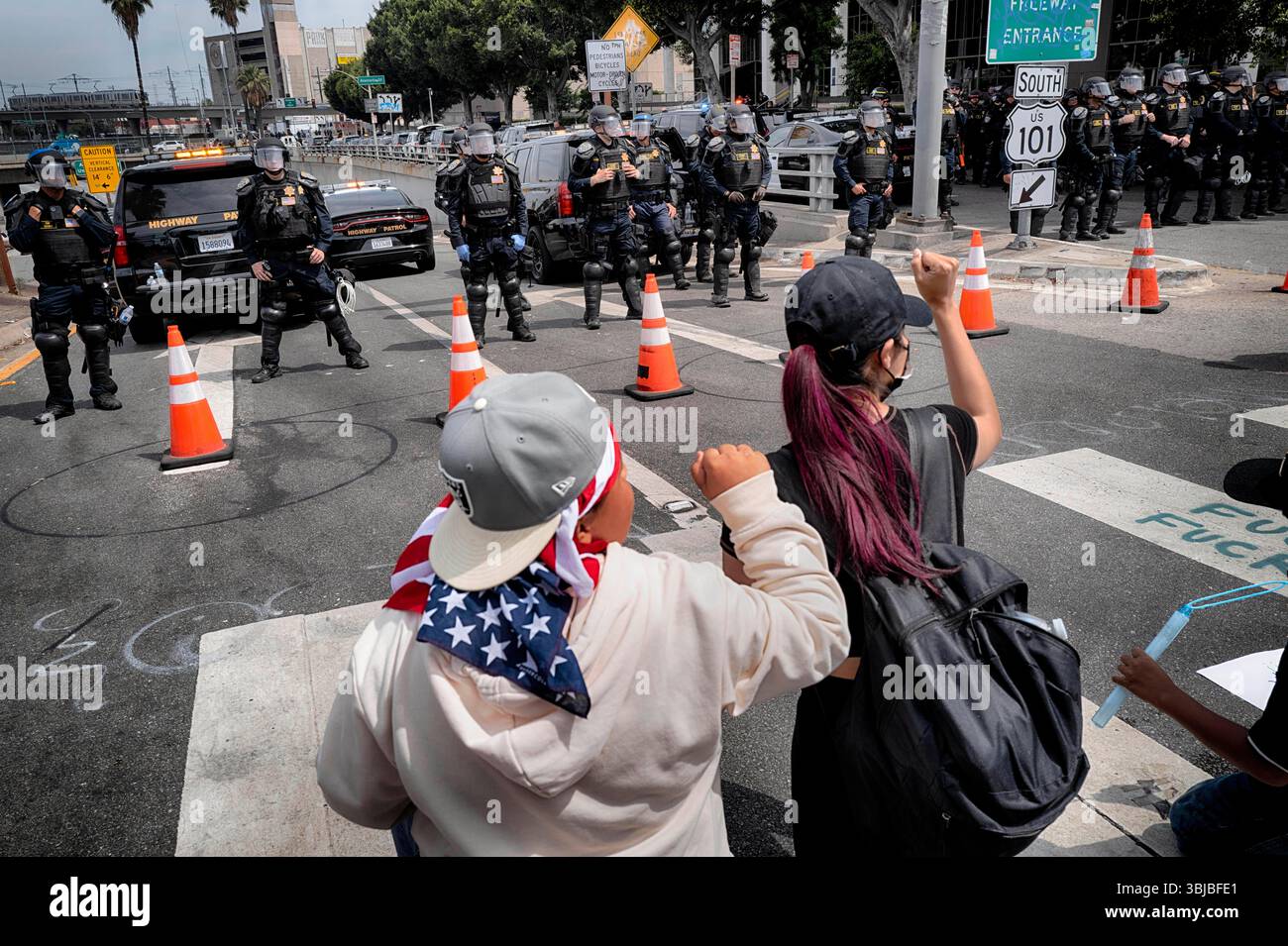 California Highway Patrol officers block a freeway entrance during a ...