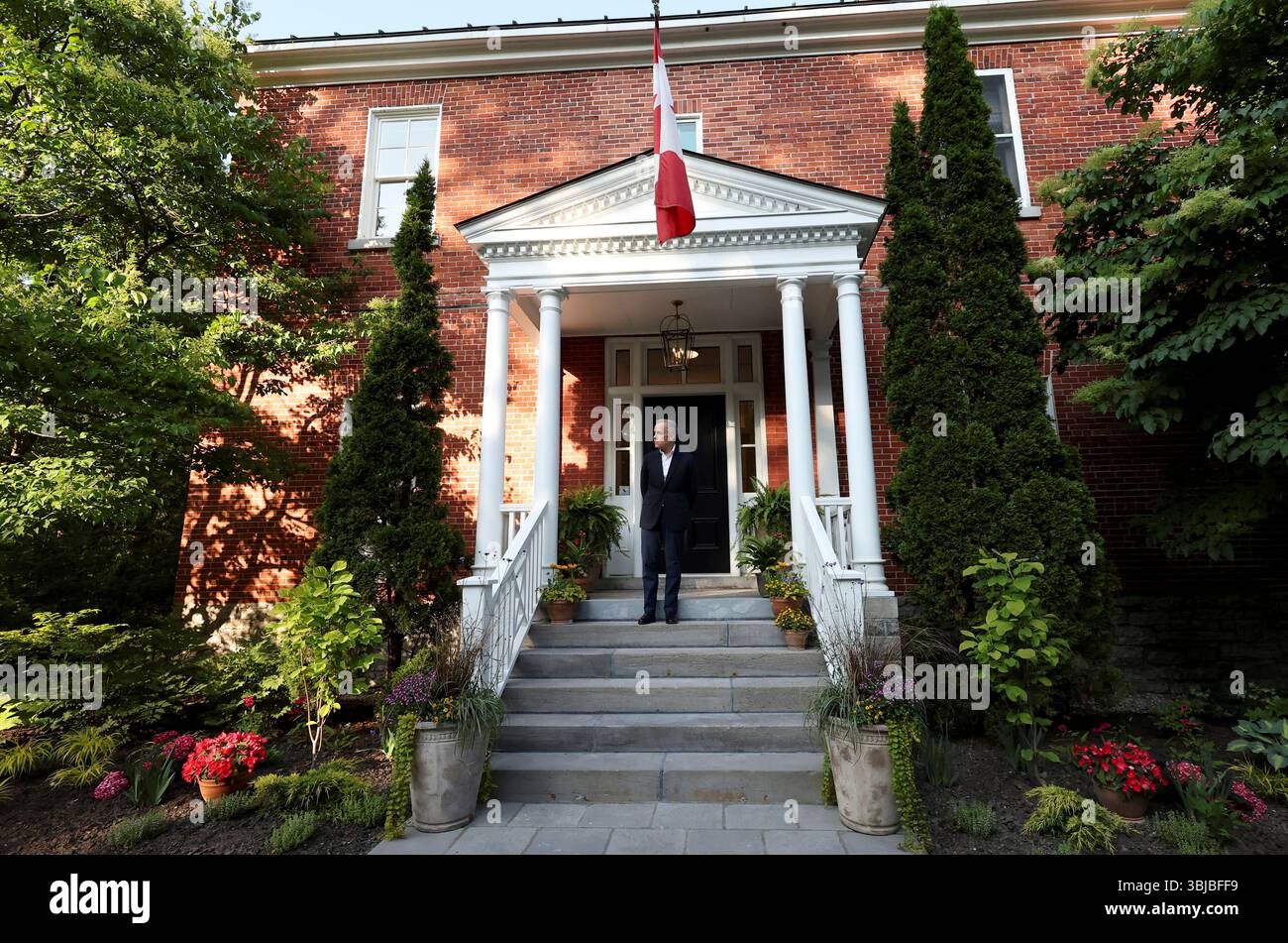 Canada's Prime Minister Mark Carney waits for the arrival of Britain's ...