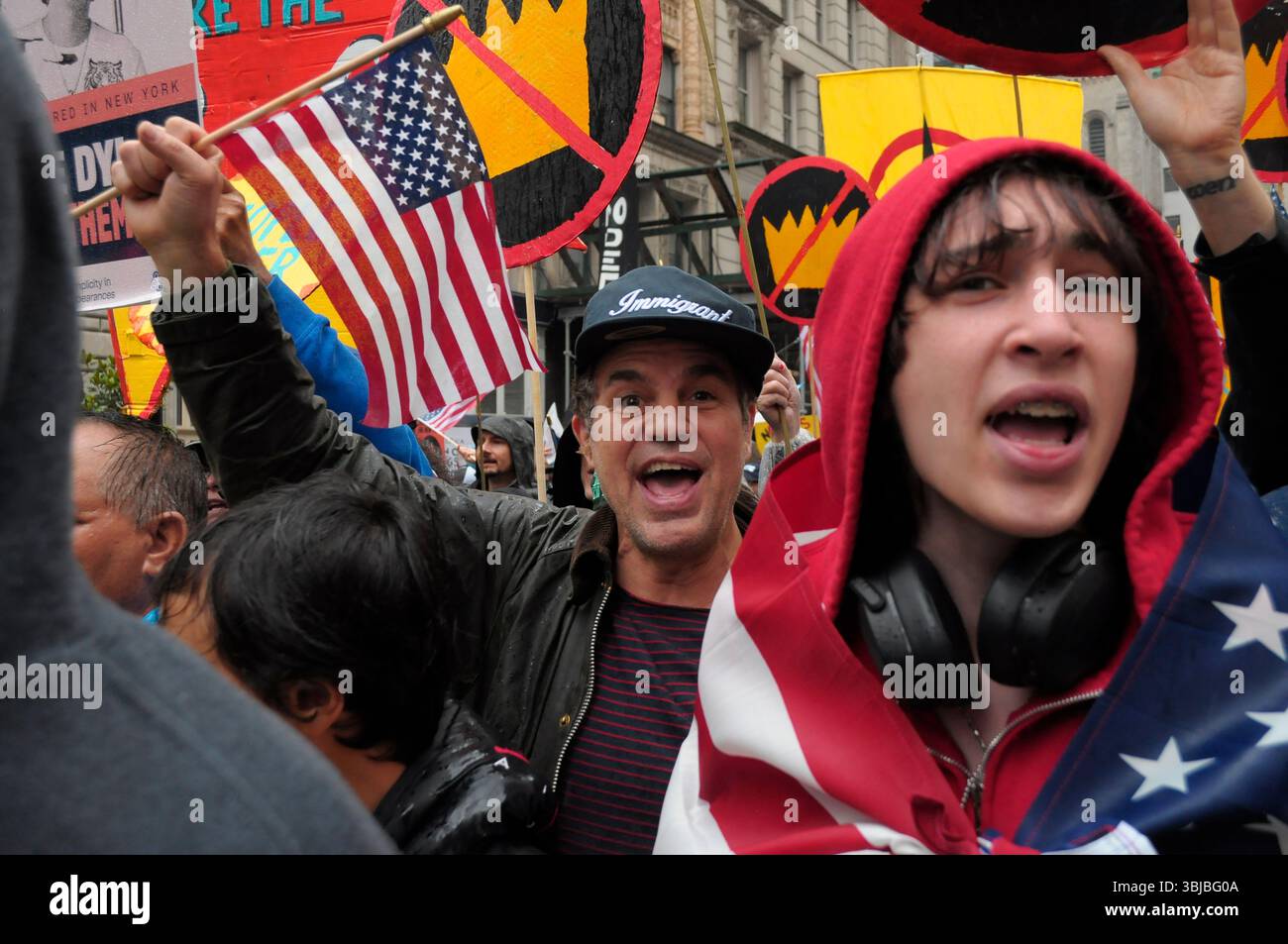 Actor Mark Ruffalo, center, marches in an anti-Trump rally ...