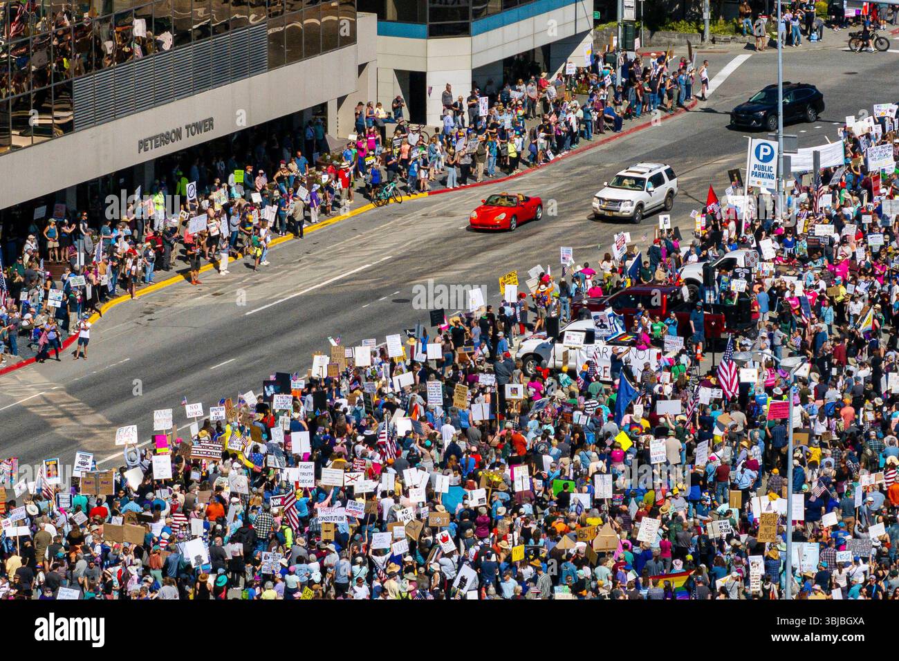 People gather in downtown Anchorage, Alaska, as part of the nationwide ...