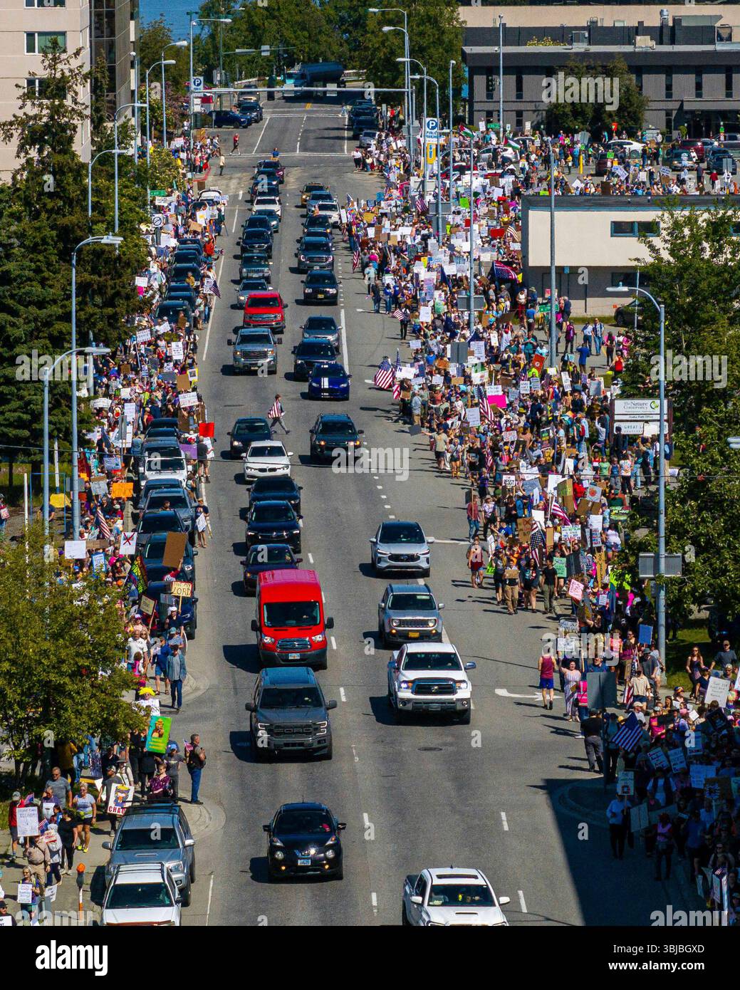 People gather in downtown Anchorage, Alaska, as part of the nationwide ...
