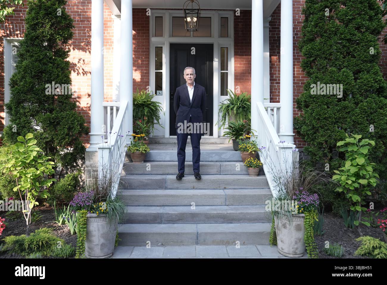 Prime Minister of Canada Mark Carney waits to greet Prime Minister Sir ...
