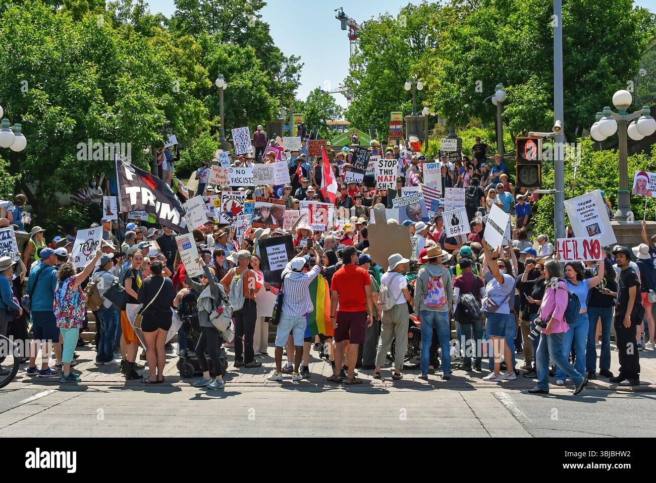 Ottawa - June 14, 2025: A large crowd gathers on the steps outside the ...