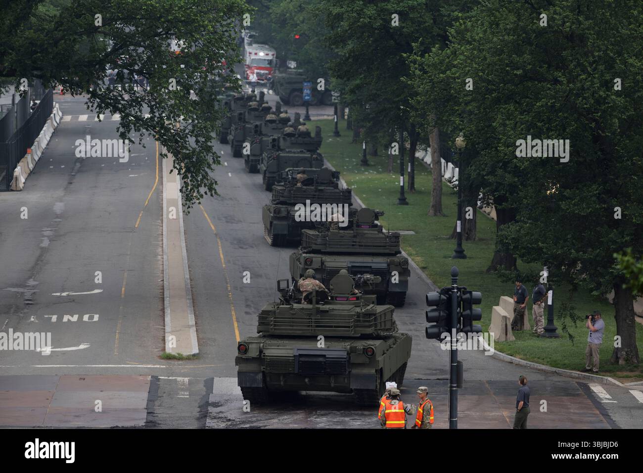 Military vehicles drive during a military parade commemorating the 250 ...