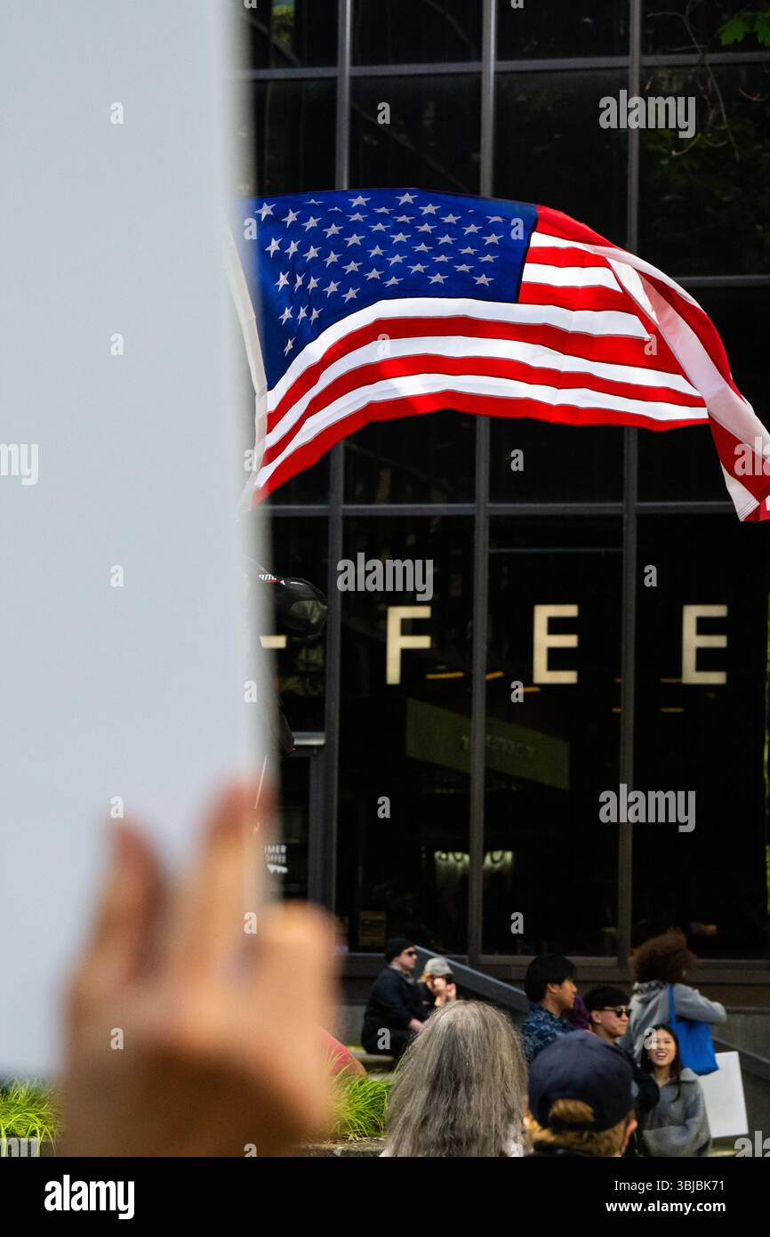 Seattle, USA. 14th Jun 2025. Protestors at the No Kings rally marching ...