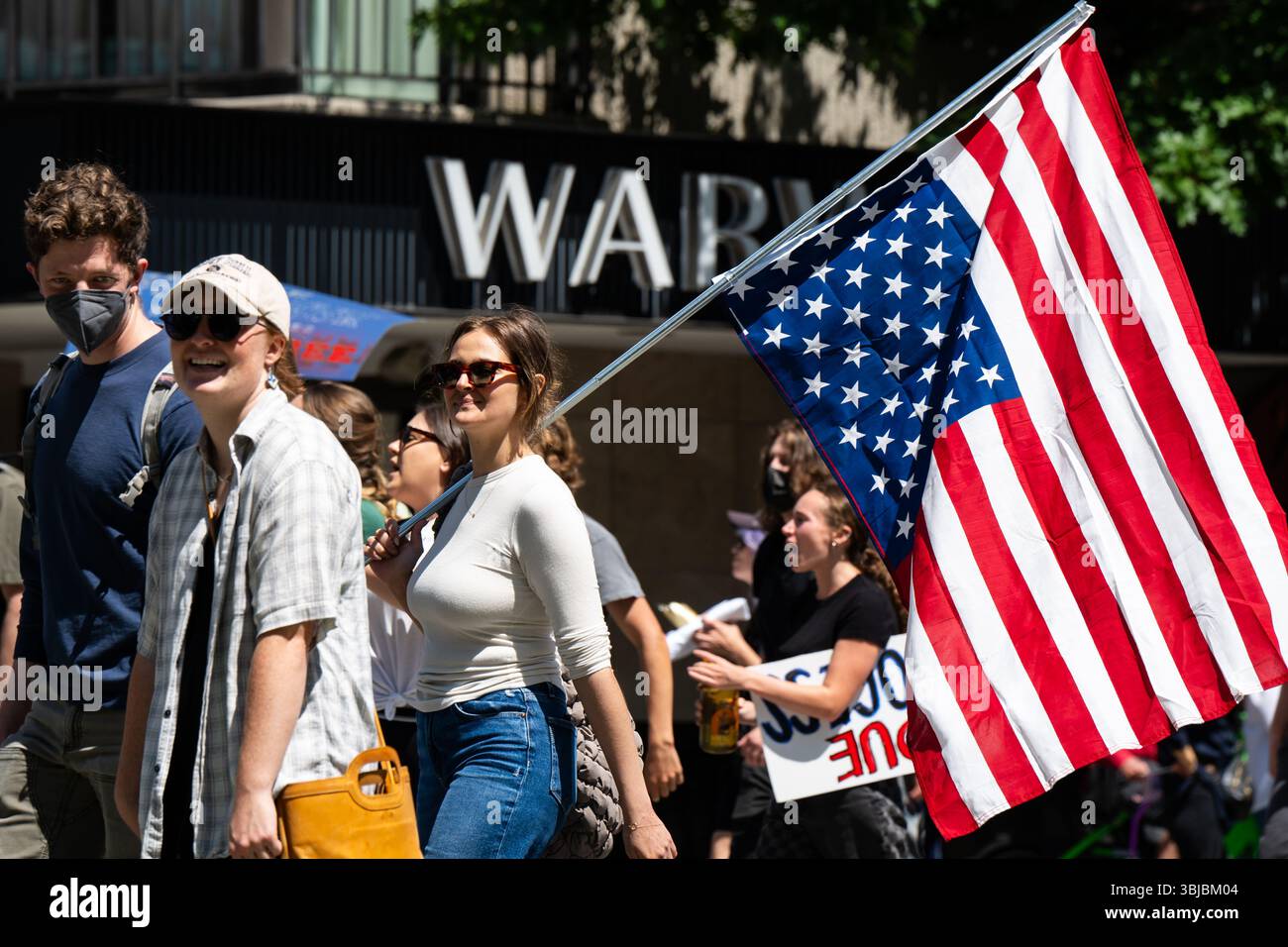 Seattle, USA. 14th Jun 2025. Protestors at the No Kings rally marching ...