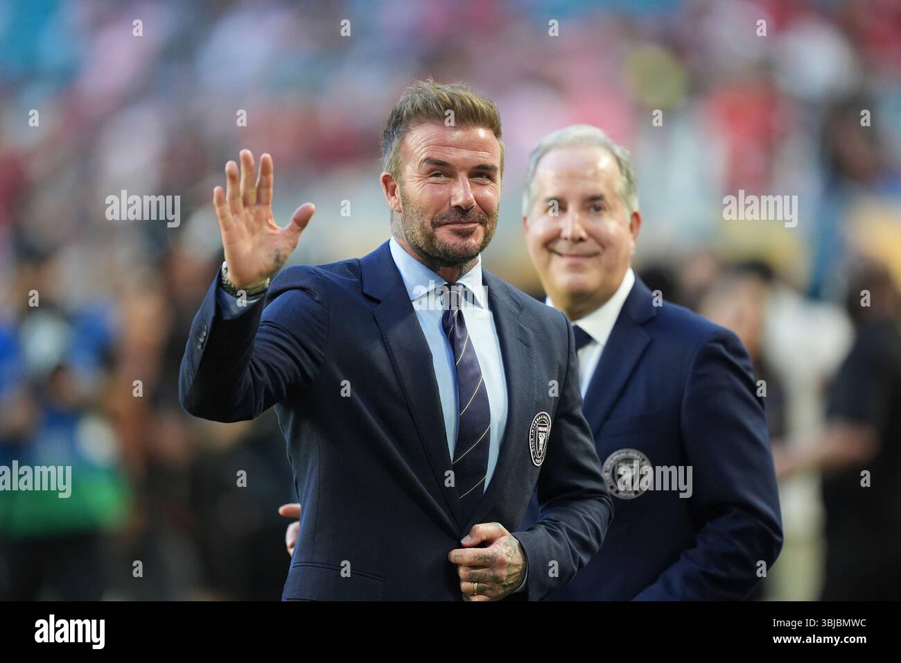 Inter Miami co-owner David Beckham, front, waves fans accompanied by ...