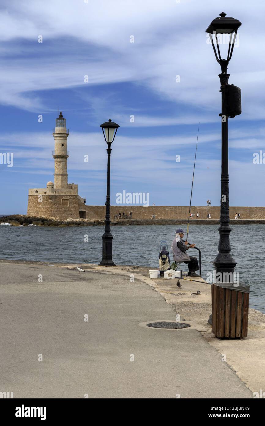 Lighthouse, Kolpos Chanion, anglers in the Venetian harbour, Chania ...
