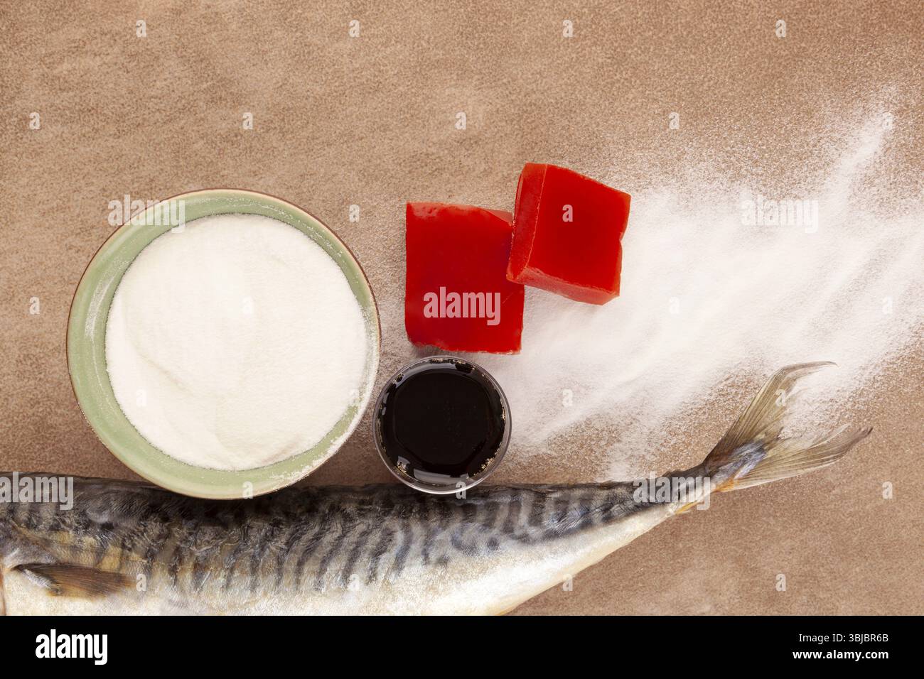 Collagen drink, powder, gelatine jelly and fresh fish with copy space ...