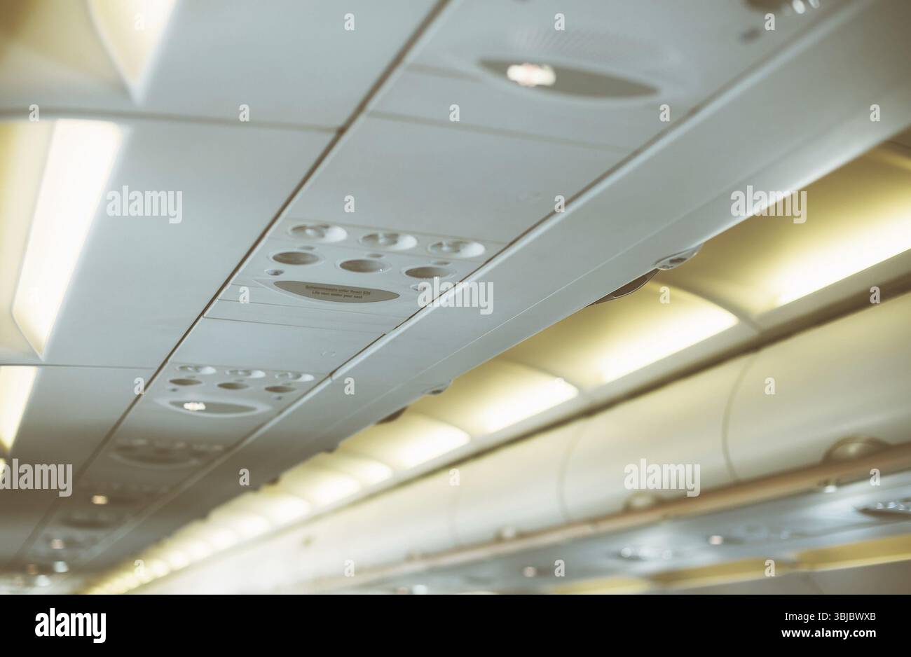 Interior inside of the plane with passengers Stock Photo - Alamy